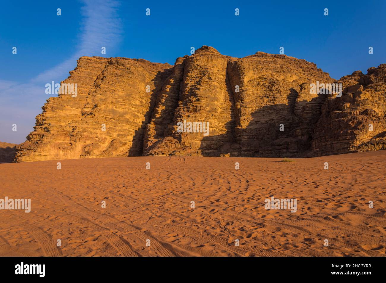 Horizontal image of a desert with rocky mountains, textures in the sand ...