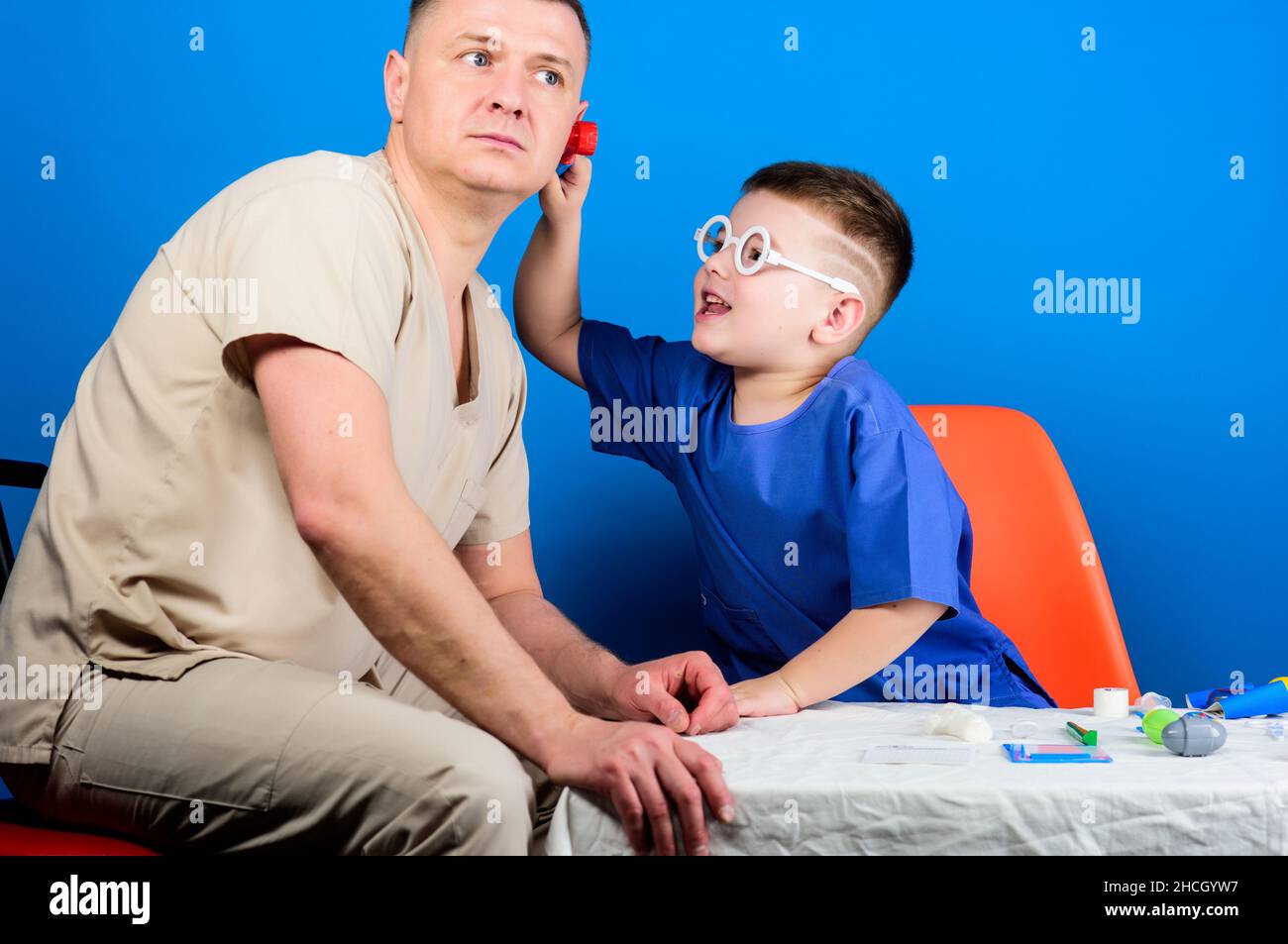 small boy with dad in hospital. happy child with father with ...