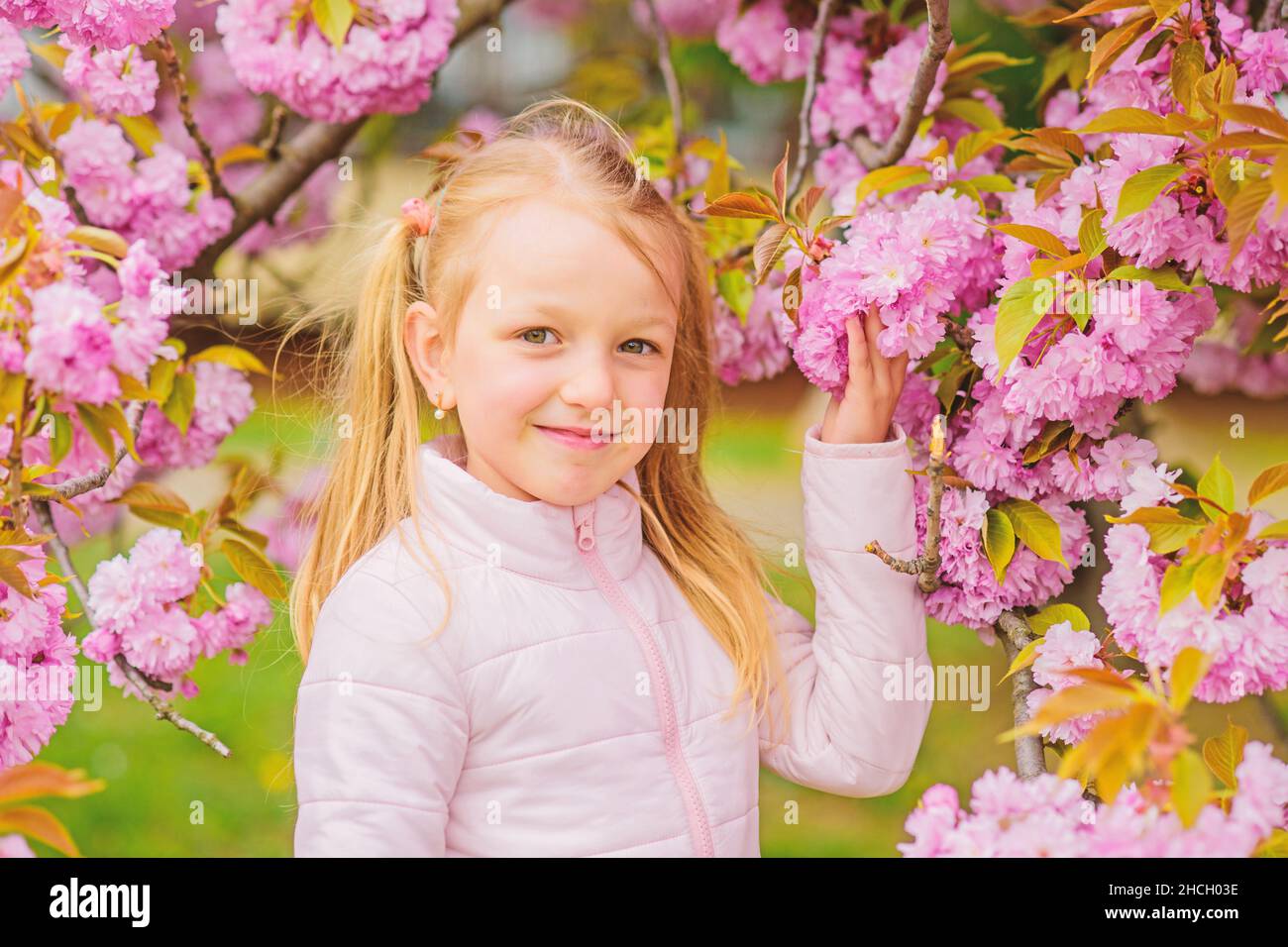 Get rid of seasonal allergy. Girl enjoying floral aroma. Pollen allergy ...