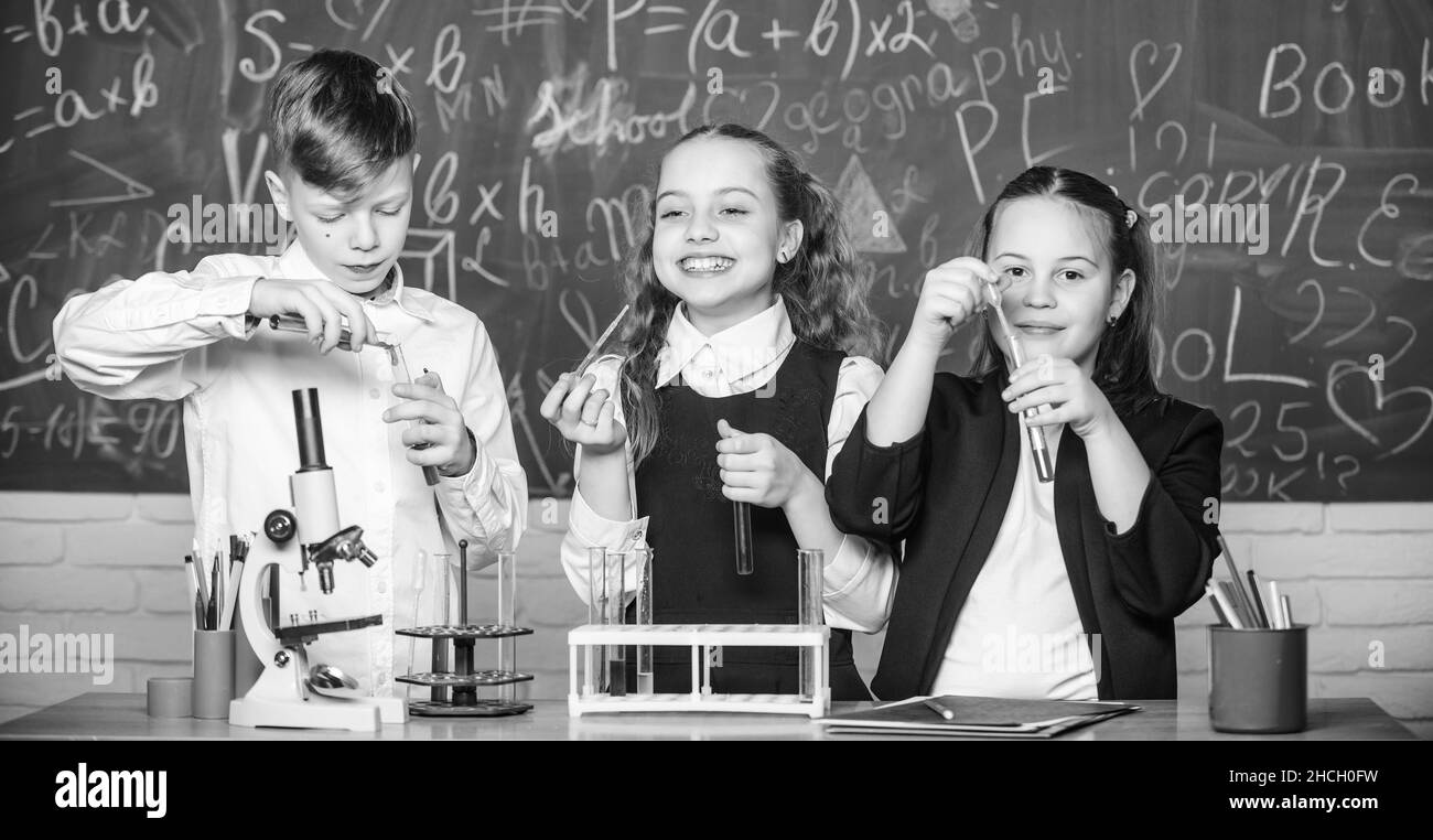 Analyzing strategy. Little children at laboratory. Little kids learn ...