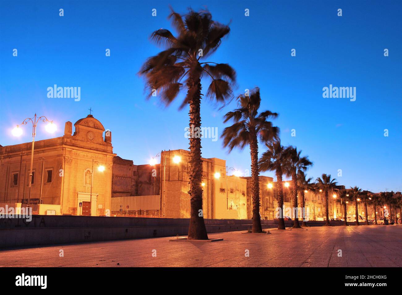 Scene at night in Taranto Stock Photo - Alamy