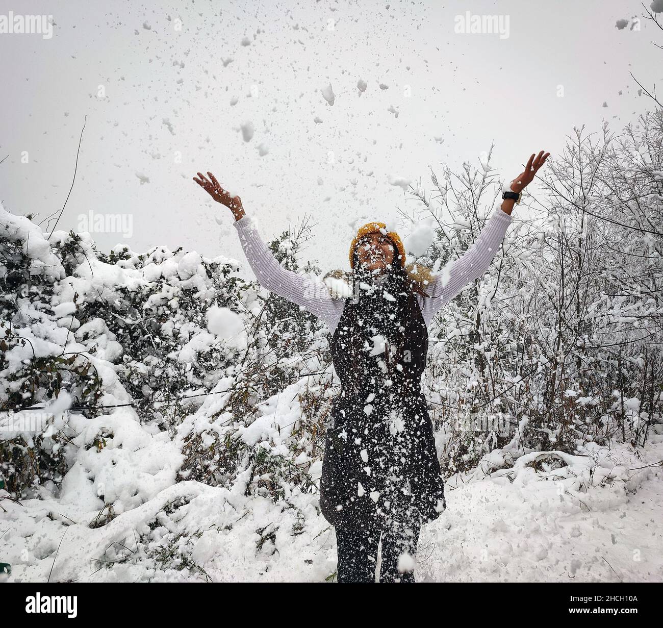 Kathmandu, Bagmati, Nepal. 29th Dec, 2021. A girl enjoys with snow ...