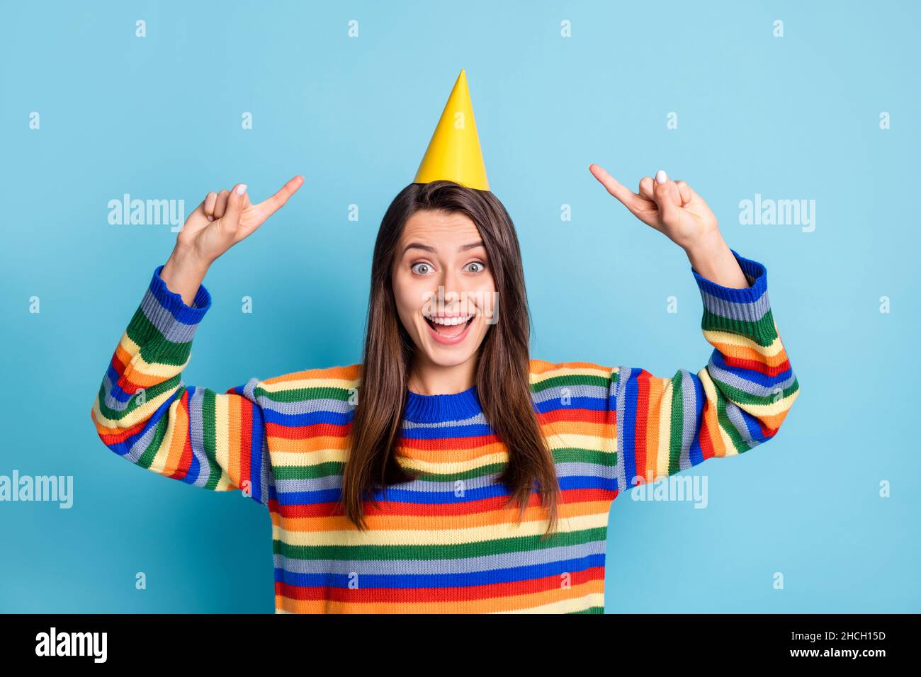 Portrait of attractive cheerful glad girl wearing demonstrating festal ...