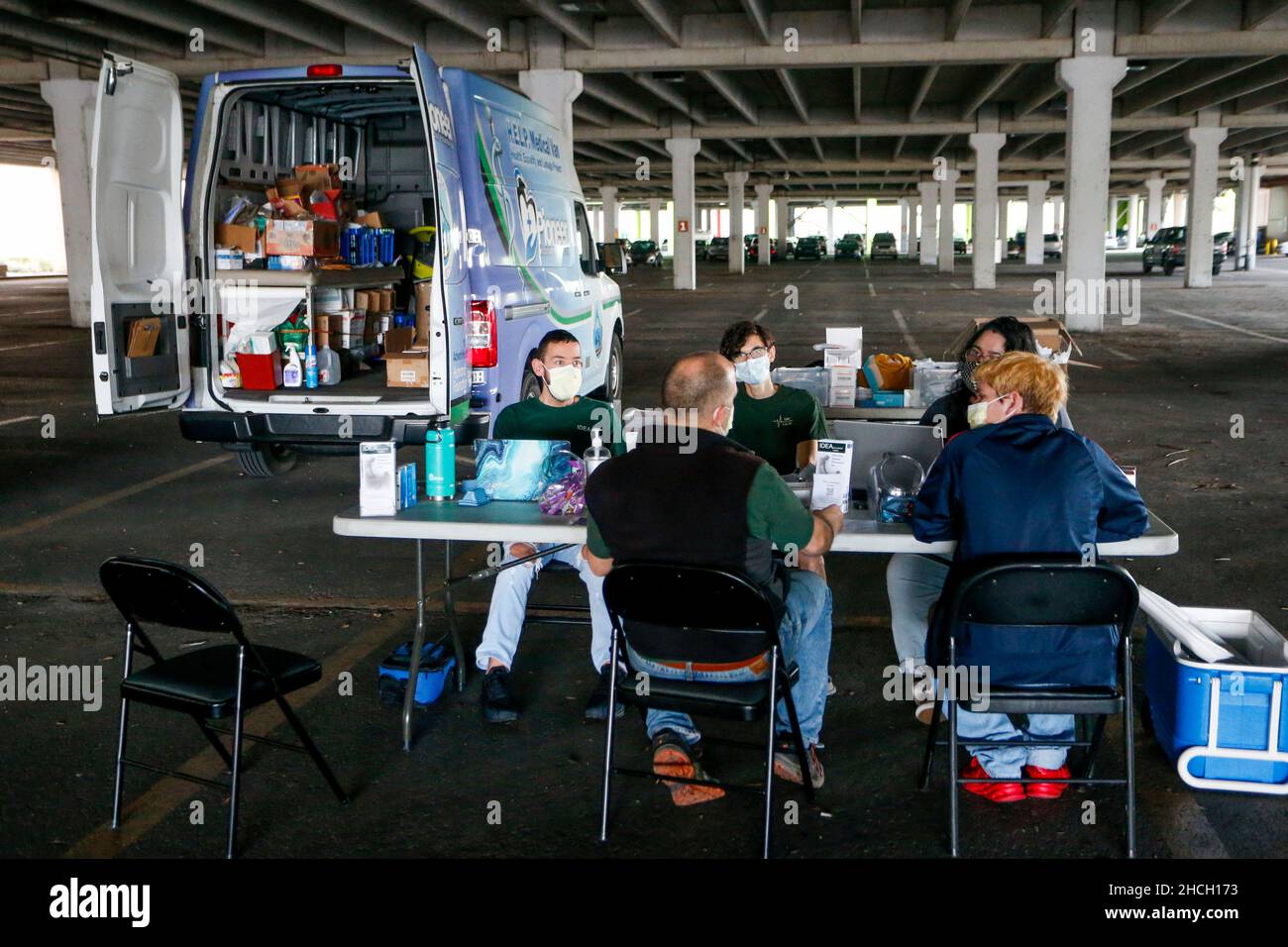 Tampa, USA. 13th Dec, 2021. Seated, from left, Lead Tester Jerren Creak ...