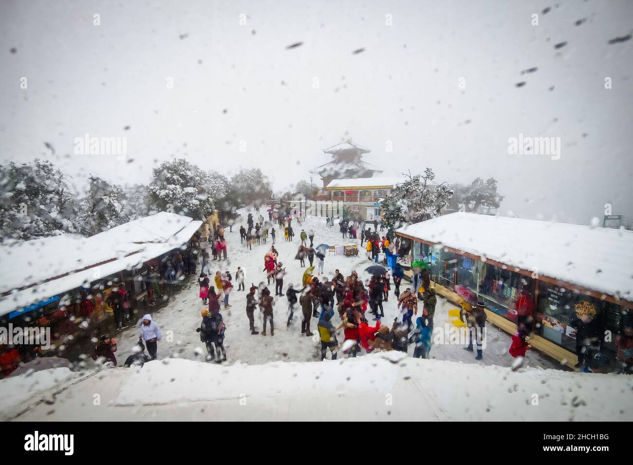 Kathmandu, Bagmati, Nepal. 29th Dec, 2021. People play with snow after ...