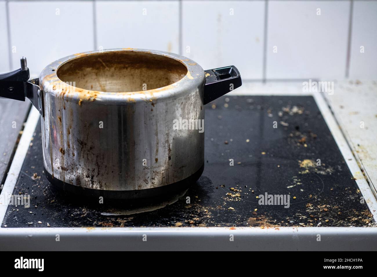 Very dirty stove and pot Stock Photo - Alamy