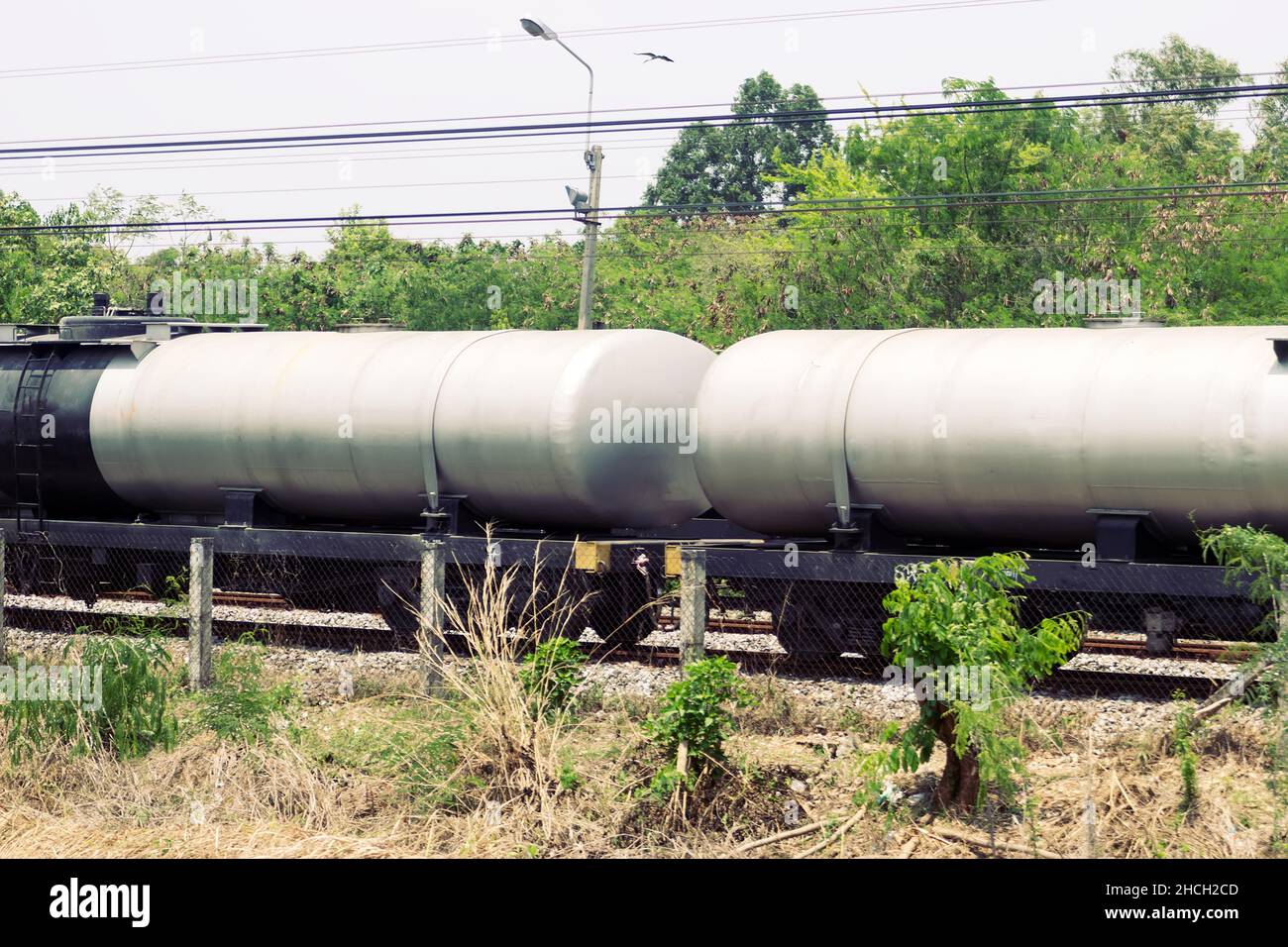 Set of tanks with oil and fuel transport by rail. Freight cars and ...