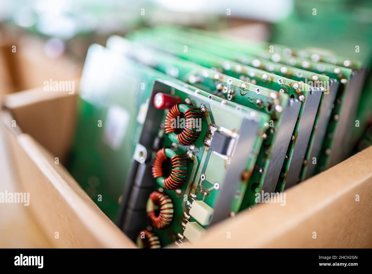 Green control chips of contemporary TFT monitors in small cardboard box ...