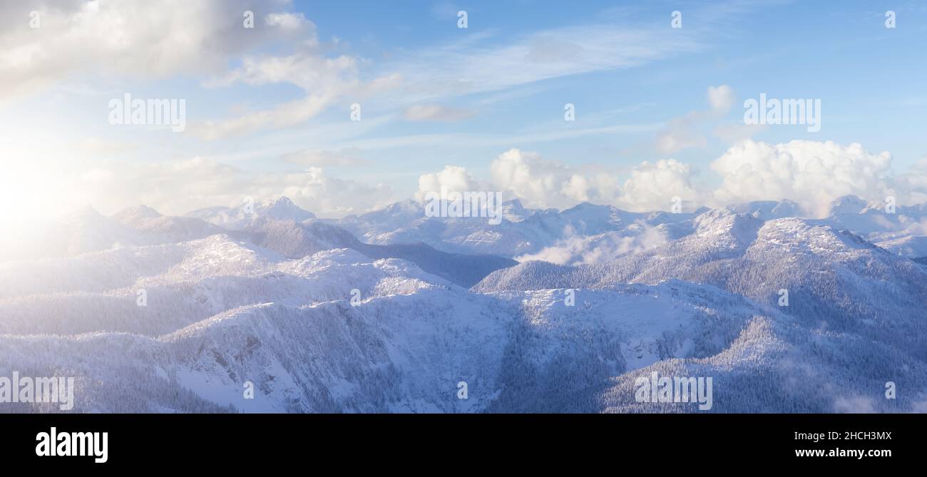 Aerial Panoramic View of Canadian Mountain covered in snow Stock Photo ...