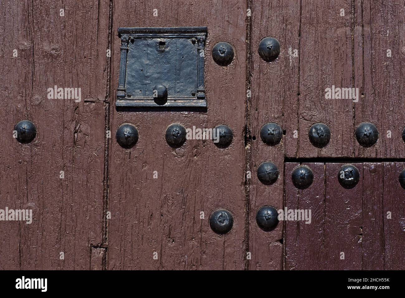 Brown helmet gate with black metal fittings Stock Photo - Alamy
