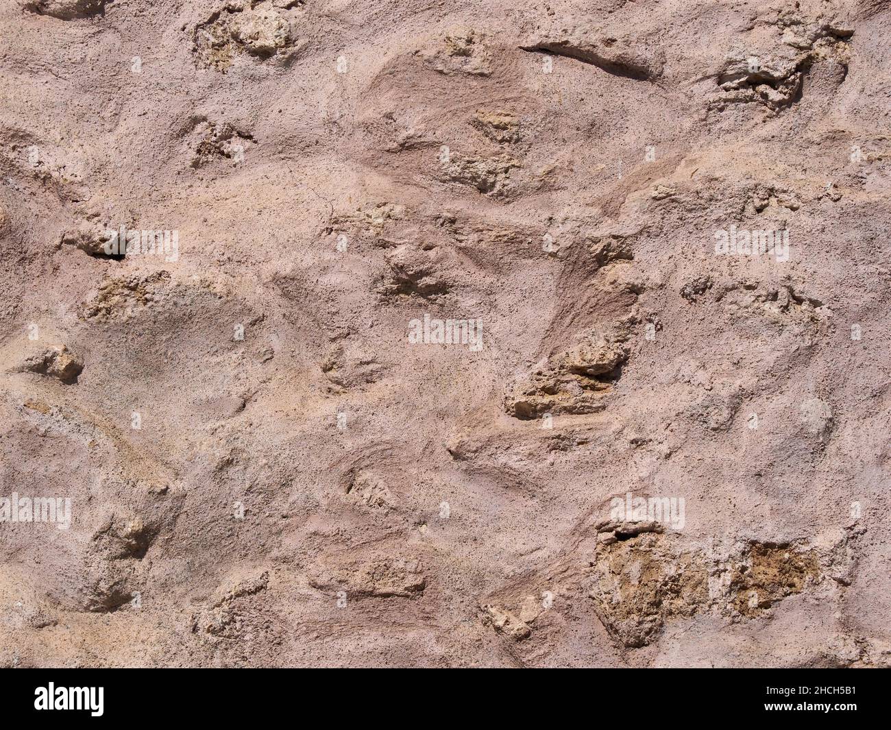 Natural stone wall with clay plaster Stock Photo - Alamy