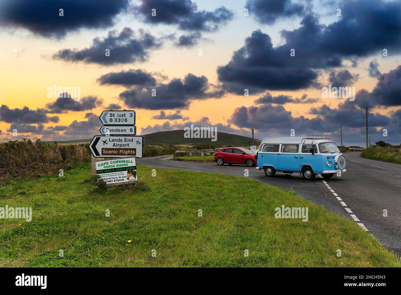 Old VW bus, vintage car, next to direction signs to St Just, Pendeen ...