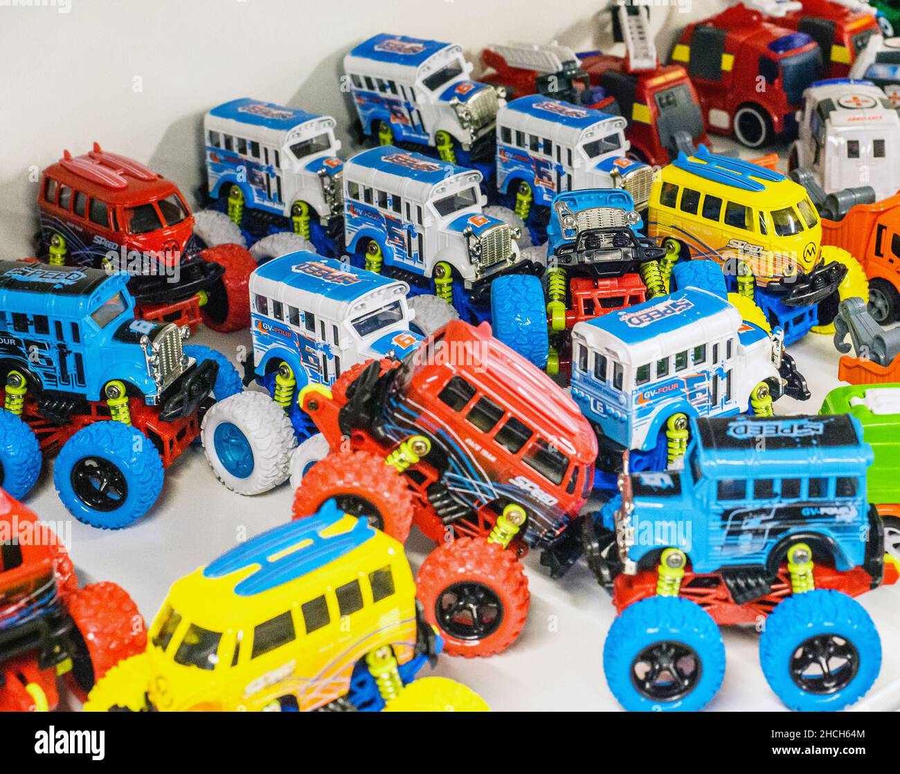 2021: chaotic pile of new toy trucks and buses, transport collapse ...