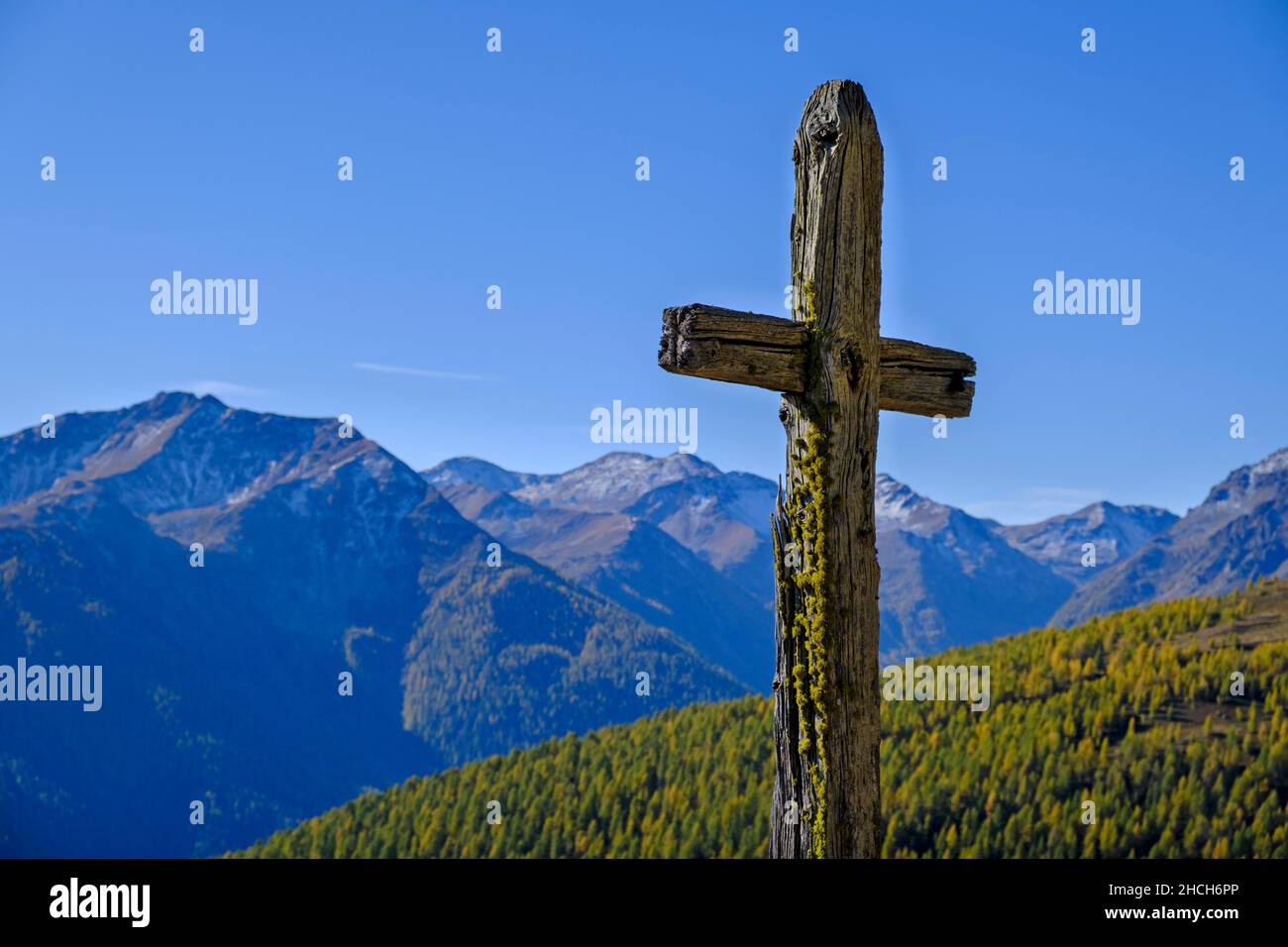 Wooden cross, mossy wayside cross in the Schwemmalm hiking area, Ulten ...