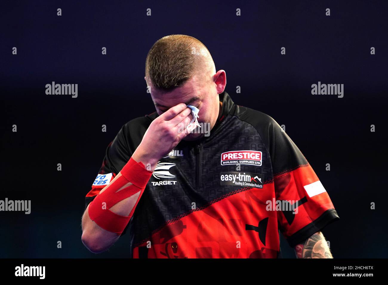 Nathan Aspinall reacts after his match against Callan Rydz on day ...