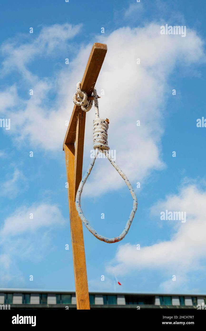Symbolic gallows stand in front of the Brandenburg Gate during a ...