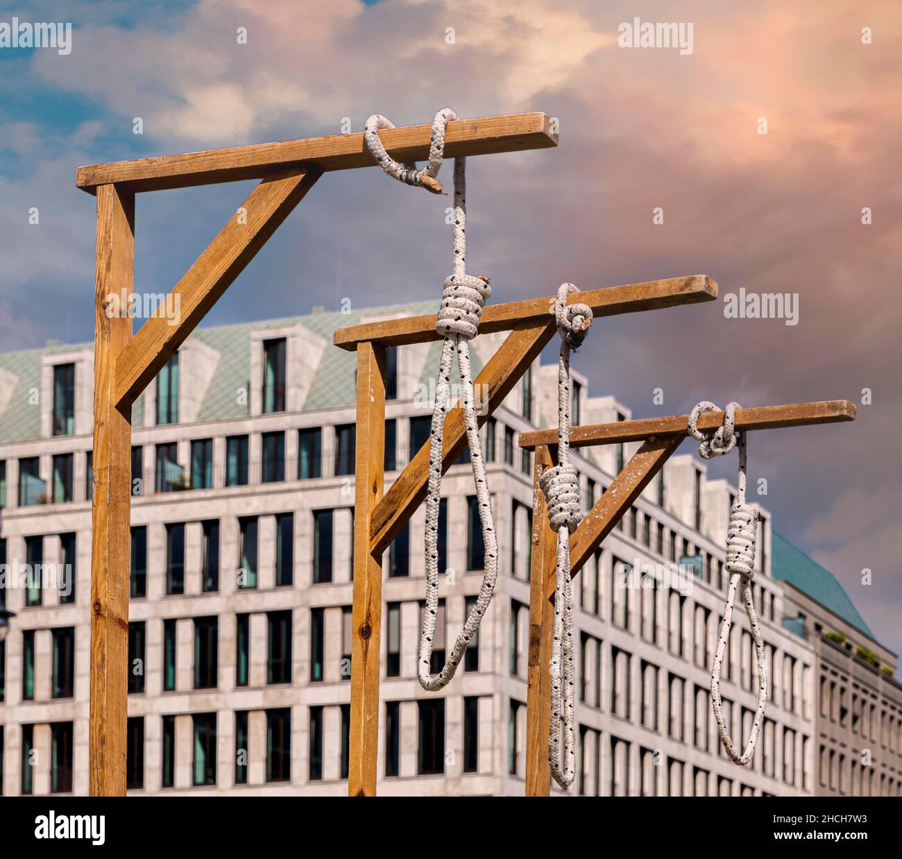 Symbolic gallows stand in front of the Brandenburg Gate during a ...