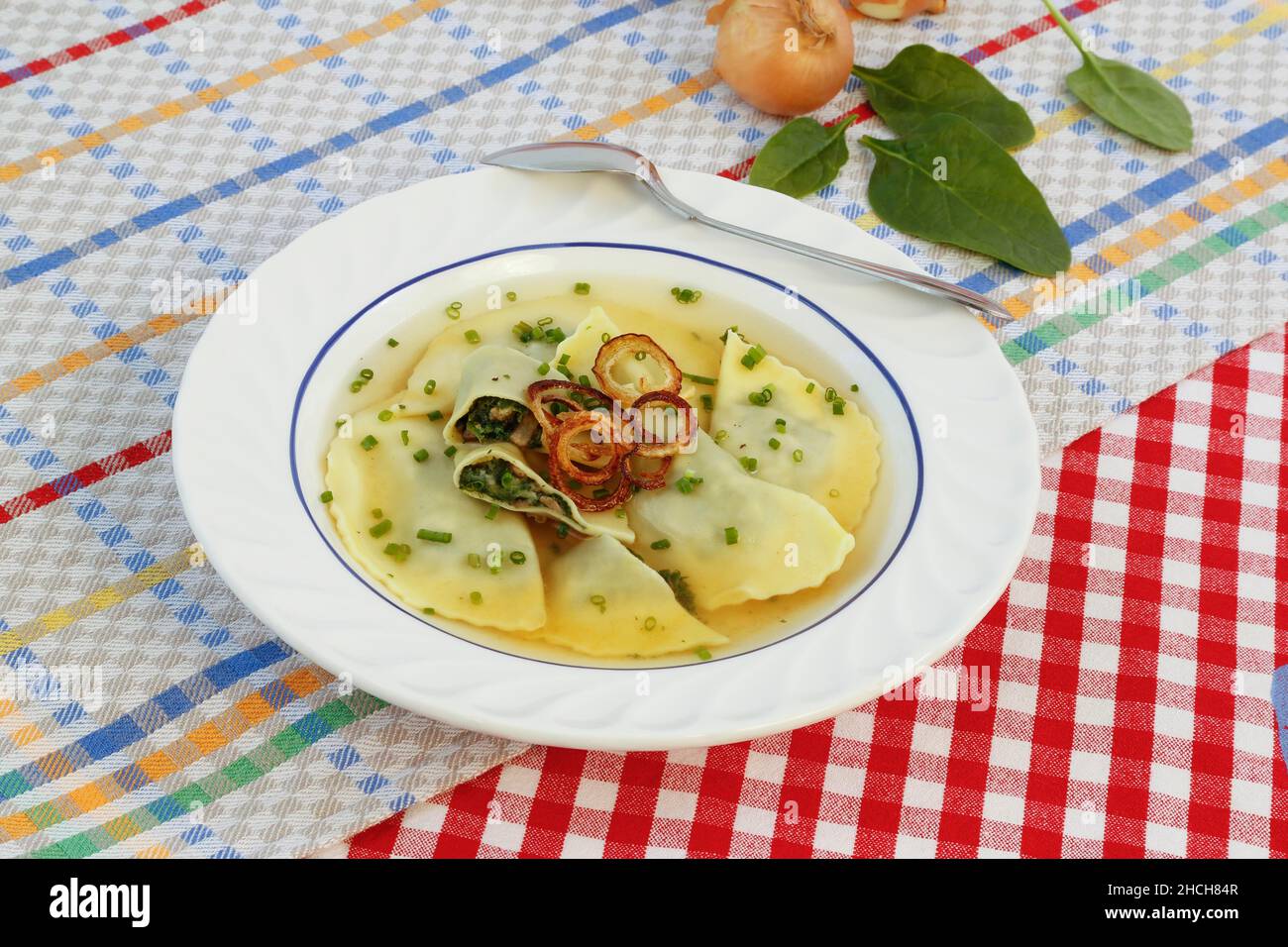 Swabian cuisine, Maultaschen in broth with stewed onion rings and ...