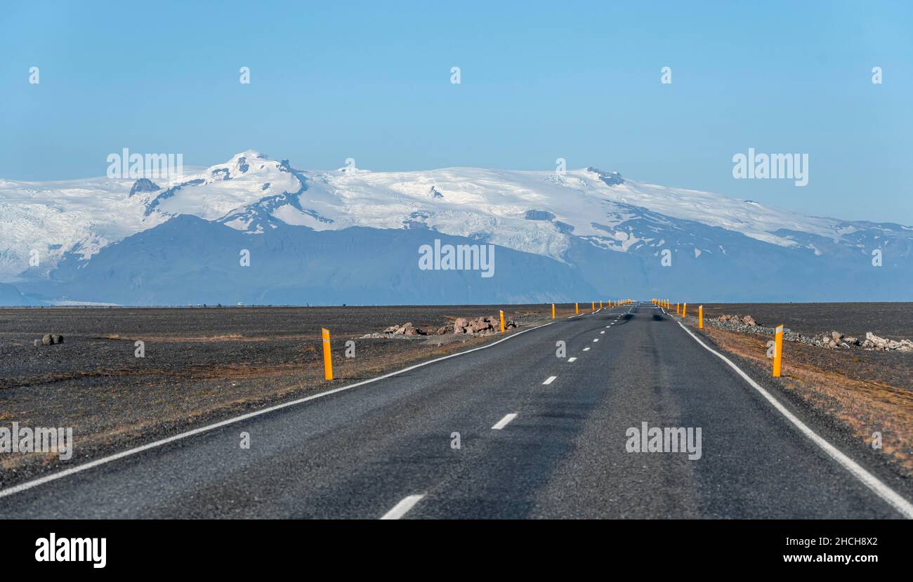 Country road, huge Vatnajoekull glacier in the back, Ring Road, Iceland ...