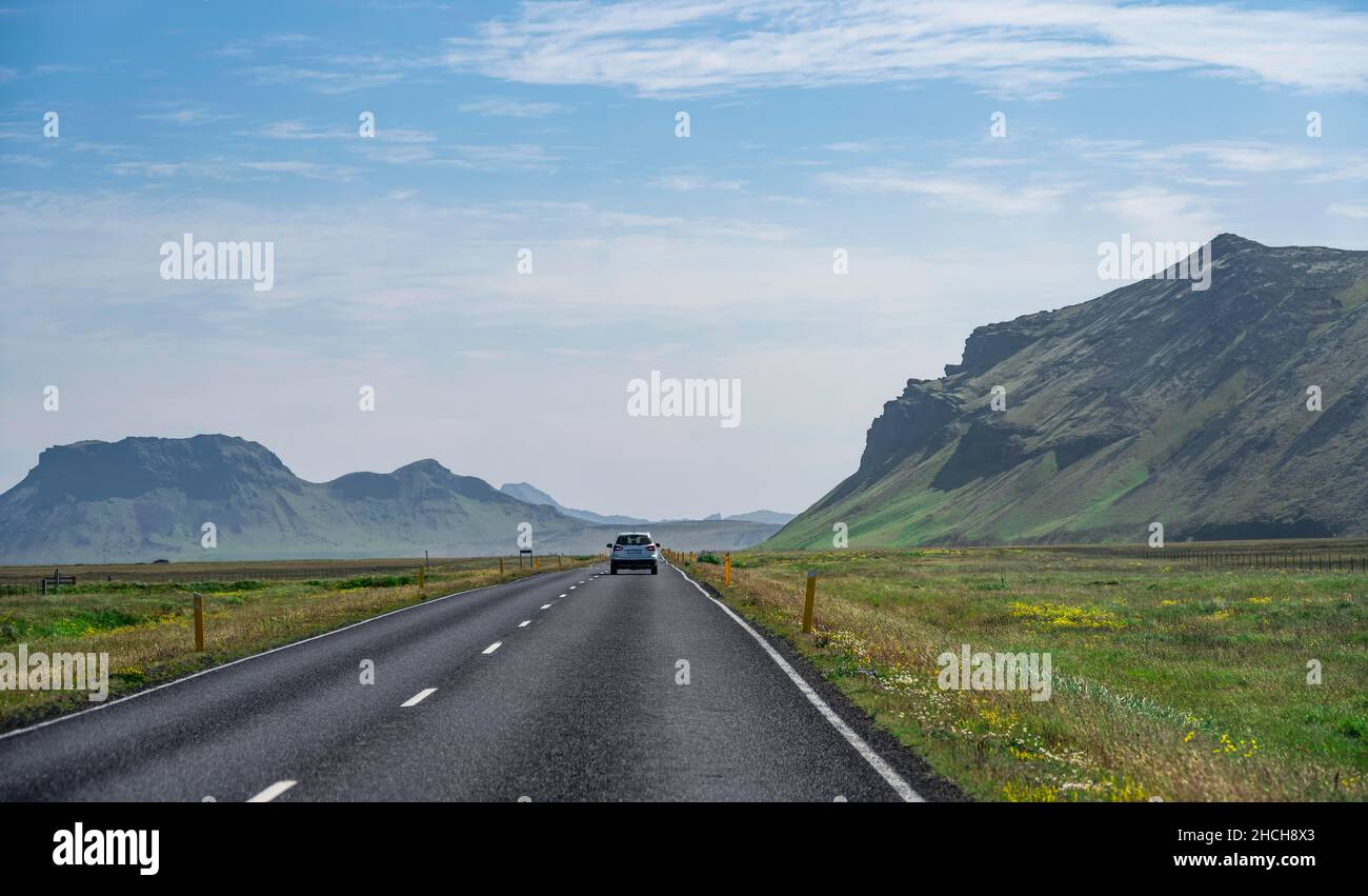 Car on the ring road, landscape with mountains, Iceland Stock Photo - Alamy