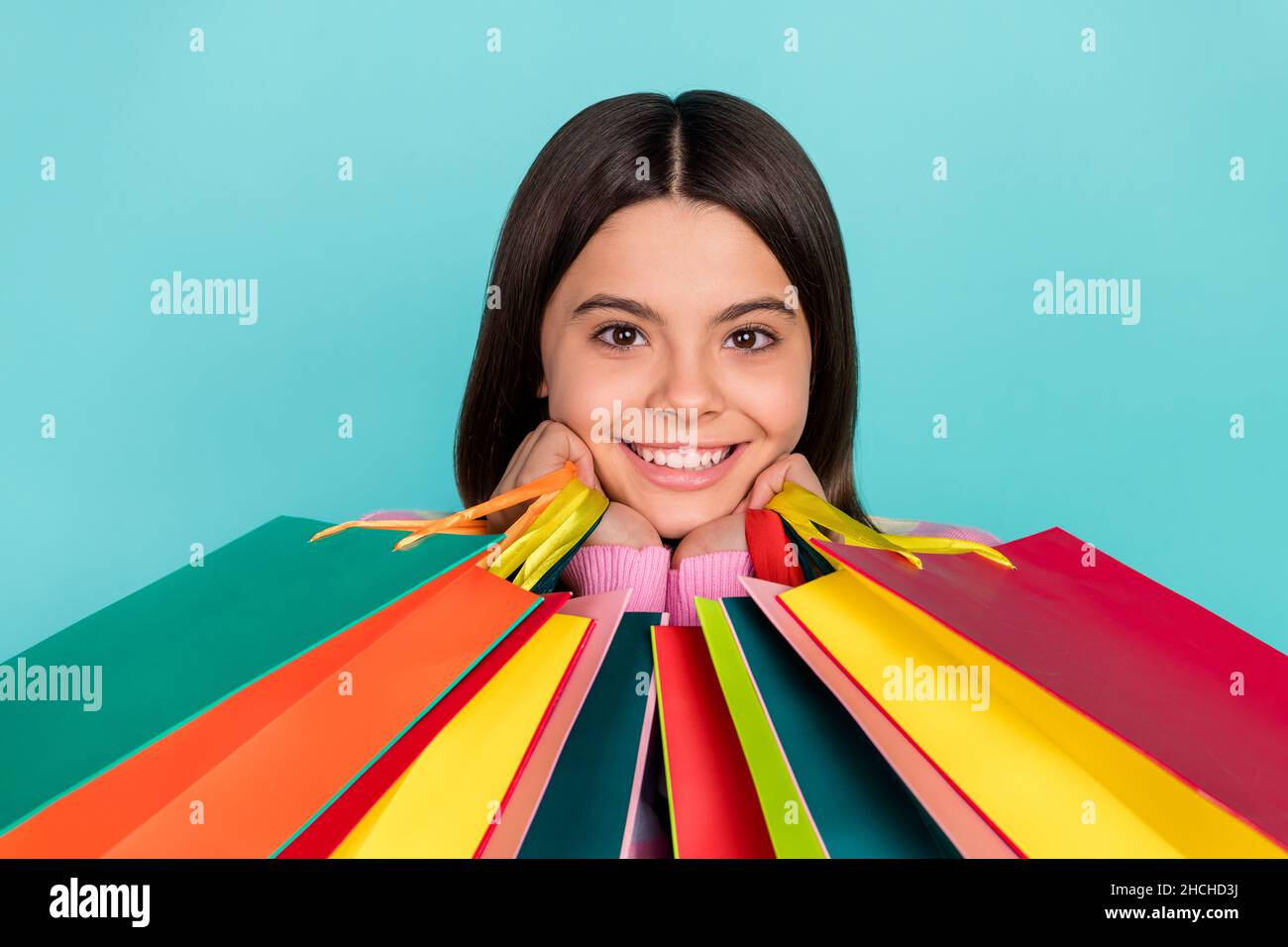Photo of dreamy pretty school girl dressed prink pullover holding bags ...