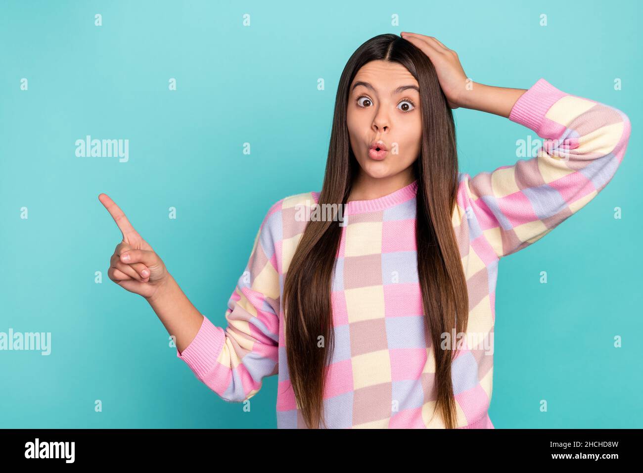 Photo of young lady point finger empty space impressed direct banner ...