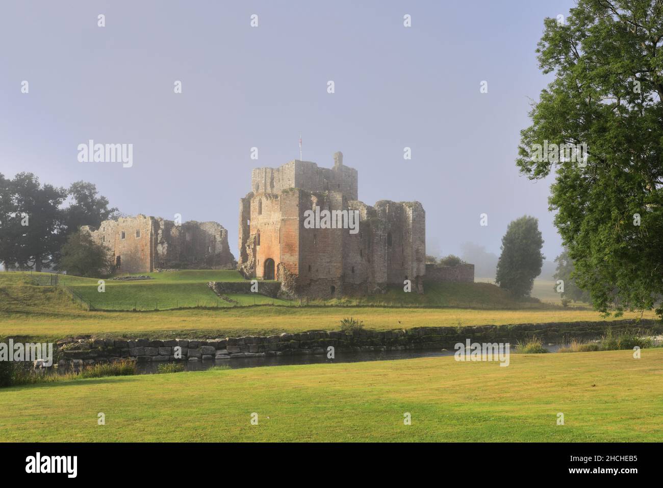 Misty view of the Ruins of Brougham Castle, river Eamont, near Penrith ...