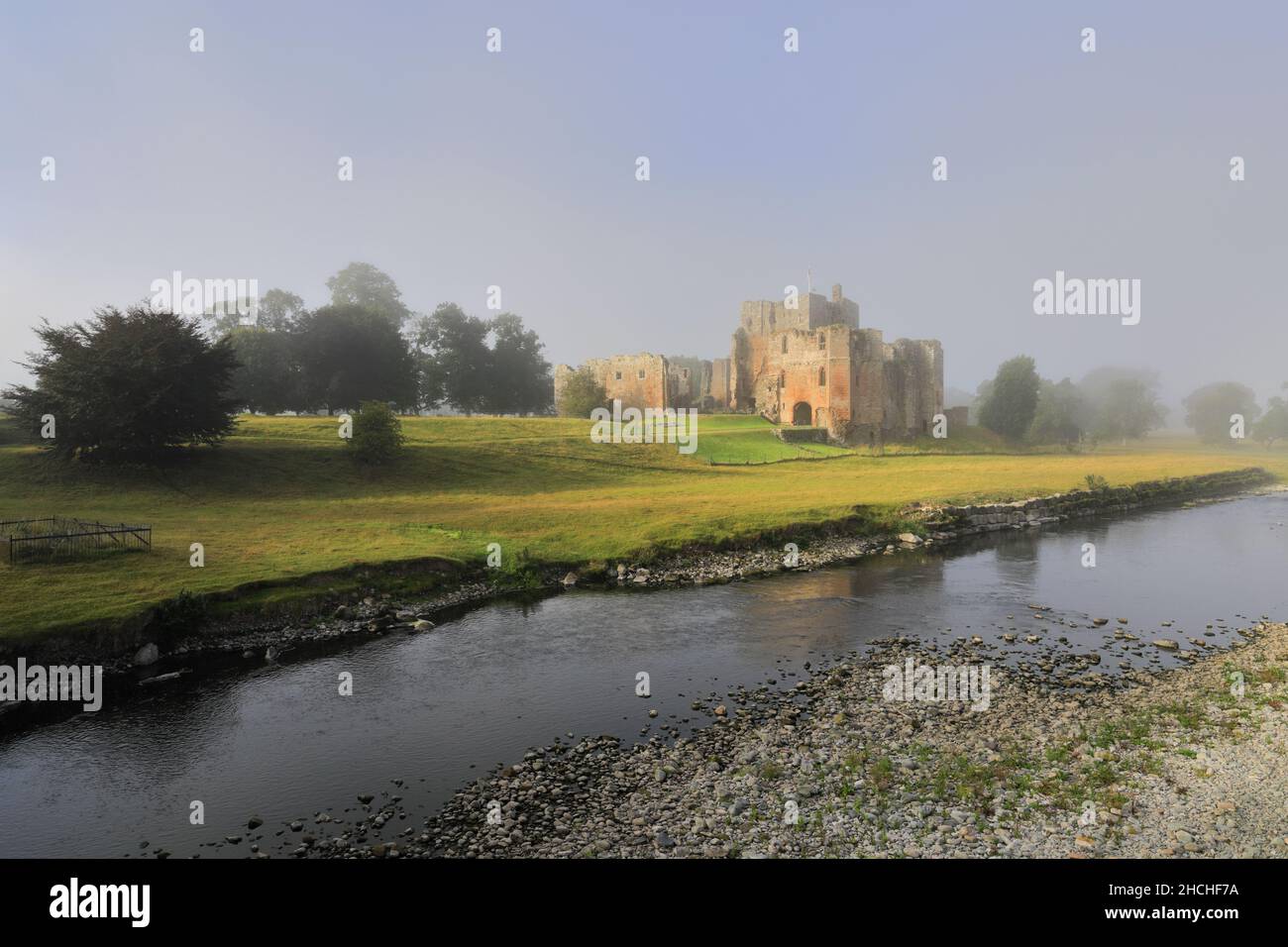 Misty view of the Ruins of Brougham Castle, river Eamont, near Penrith ...