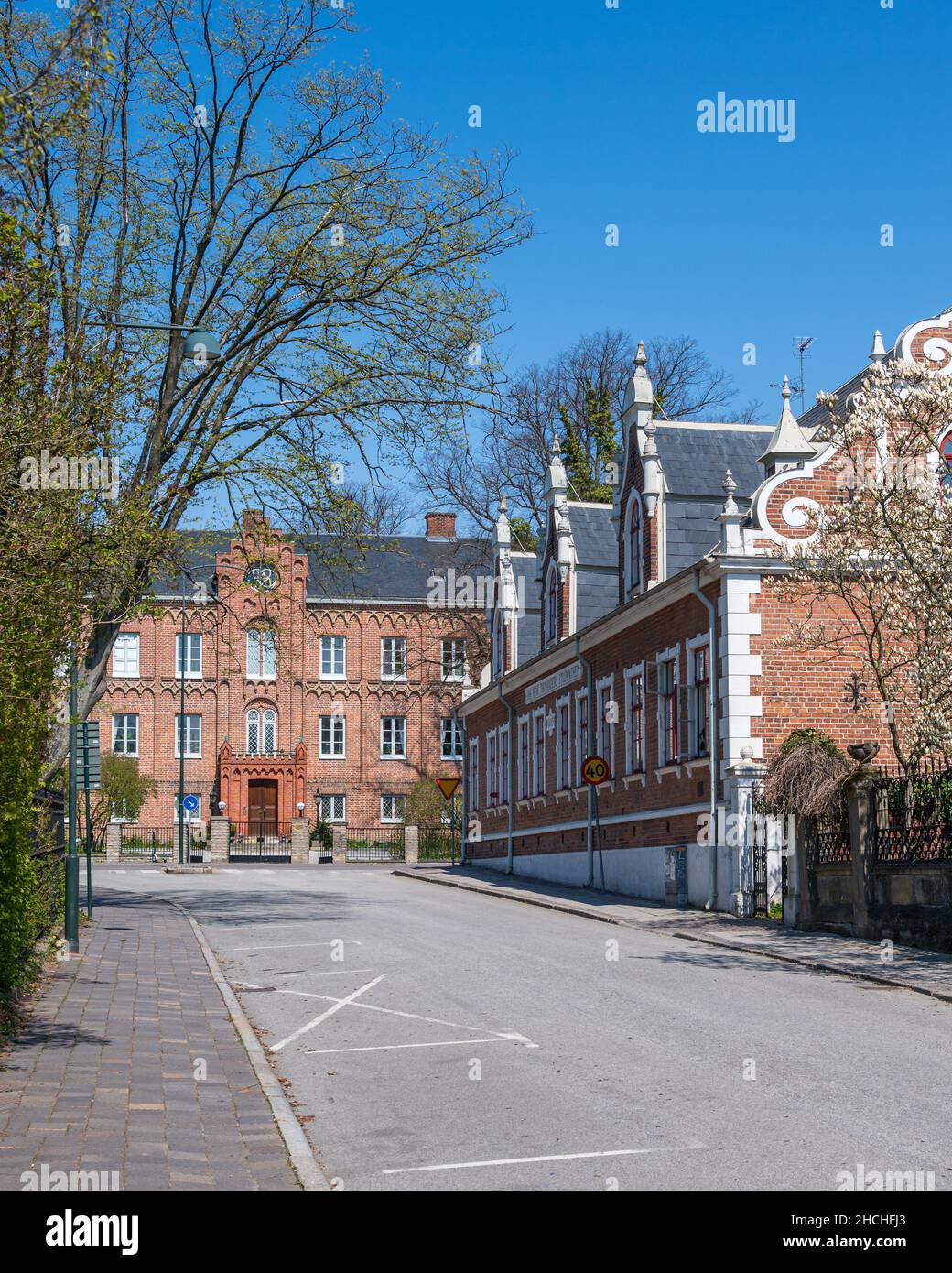 Historic buildings along city street in university town of Lund Sweden ...