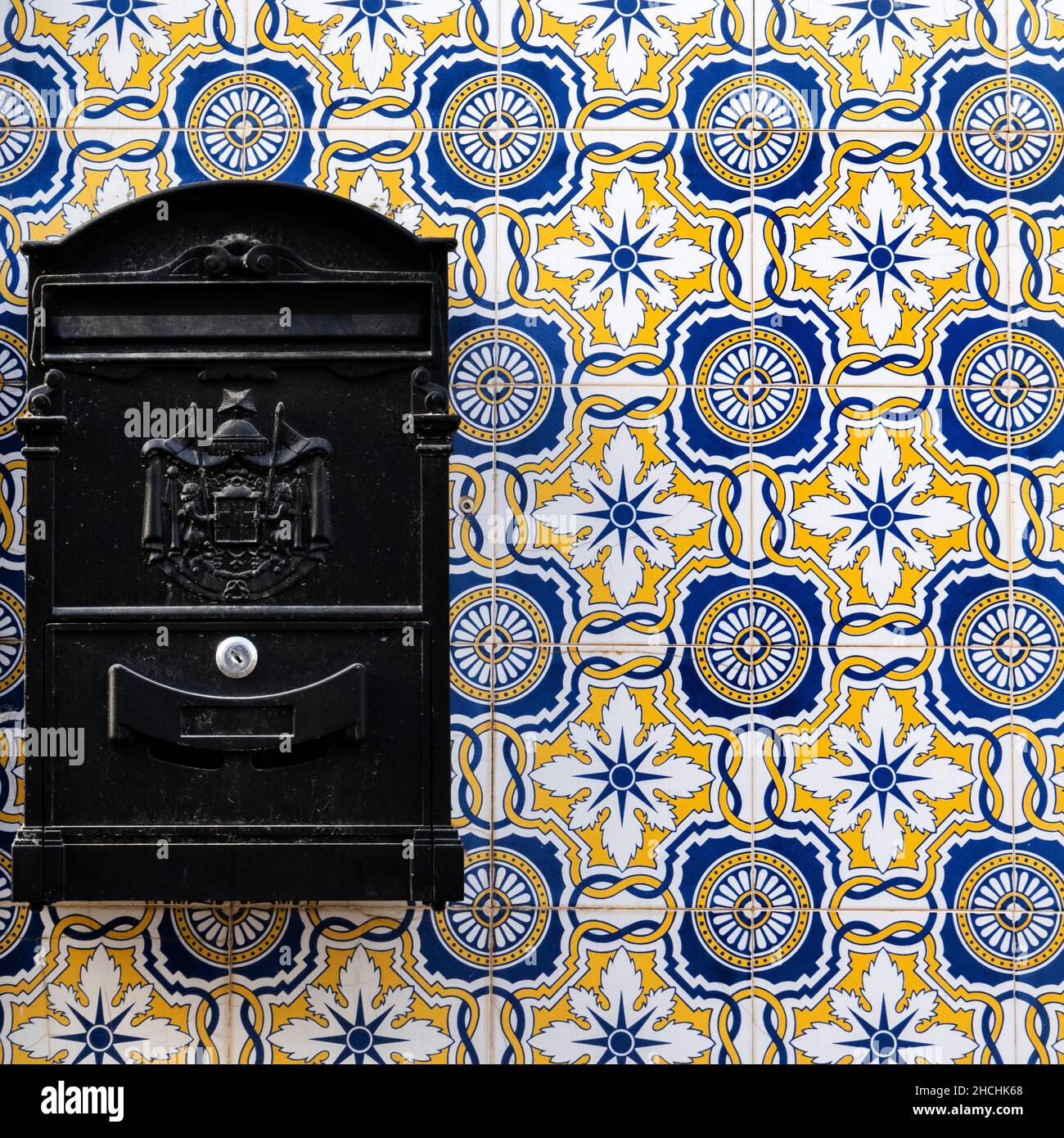 Typical details of azulejo ceramics artwork and a letter box located in ...
