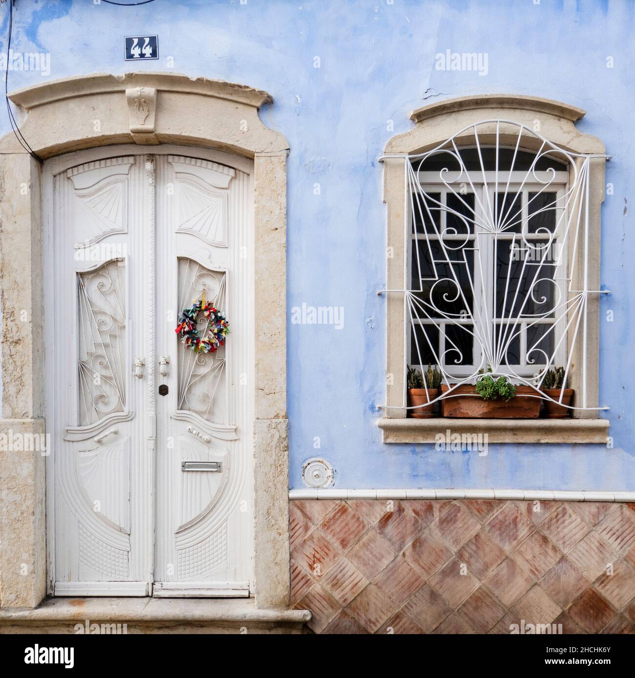 Typical architecture of Algarve vintage style doors, located in Olhao ...