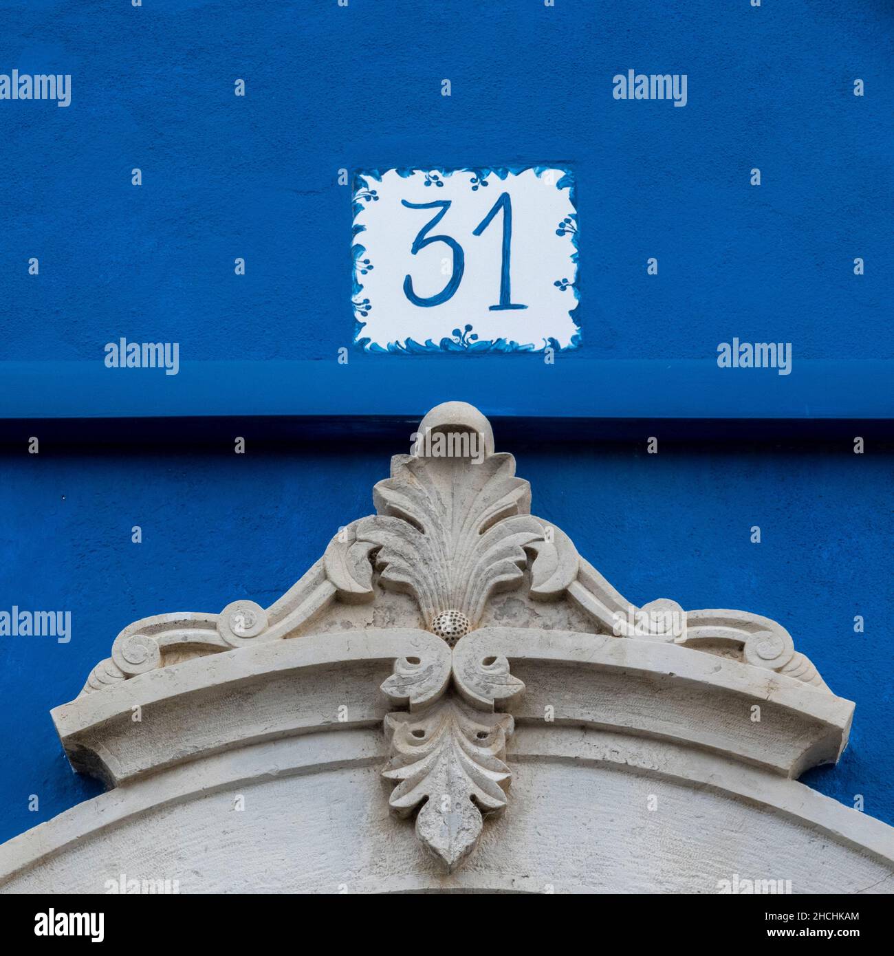 Typical architecture of Algarve vintage style house numbers, located in ...