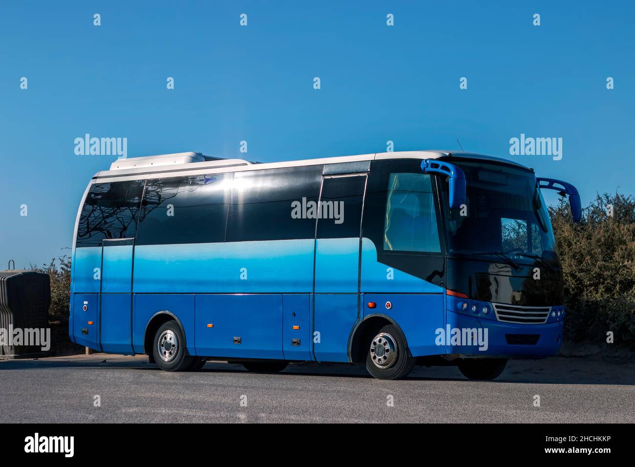 Large blue city Bus parked on the road Stock Photo - Alamy