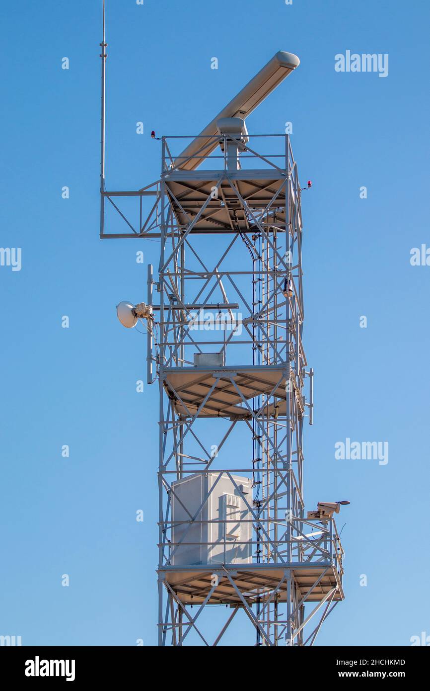 Communication, radar, internet, gps, tower over a blue sky Stock Photo ...