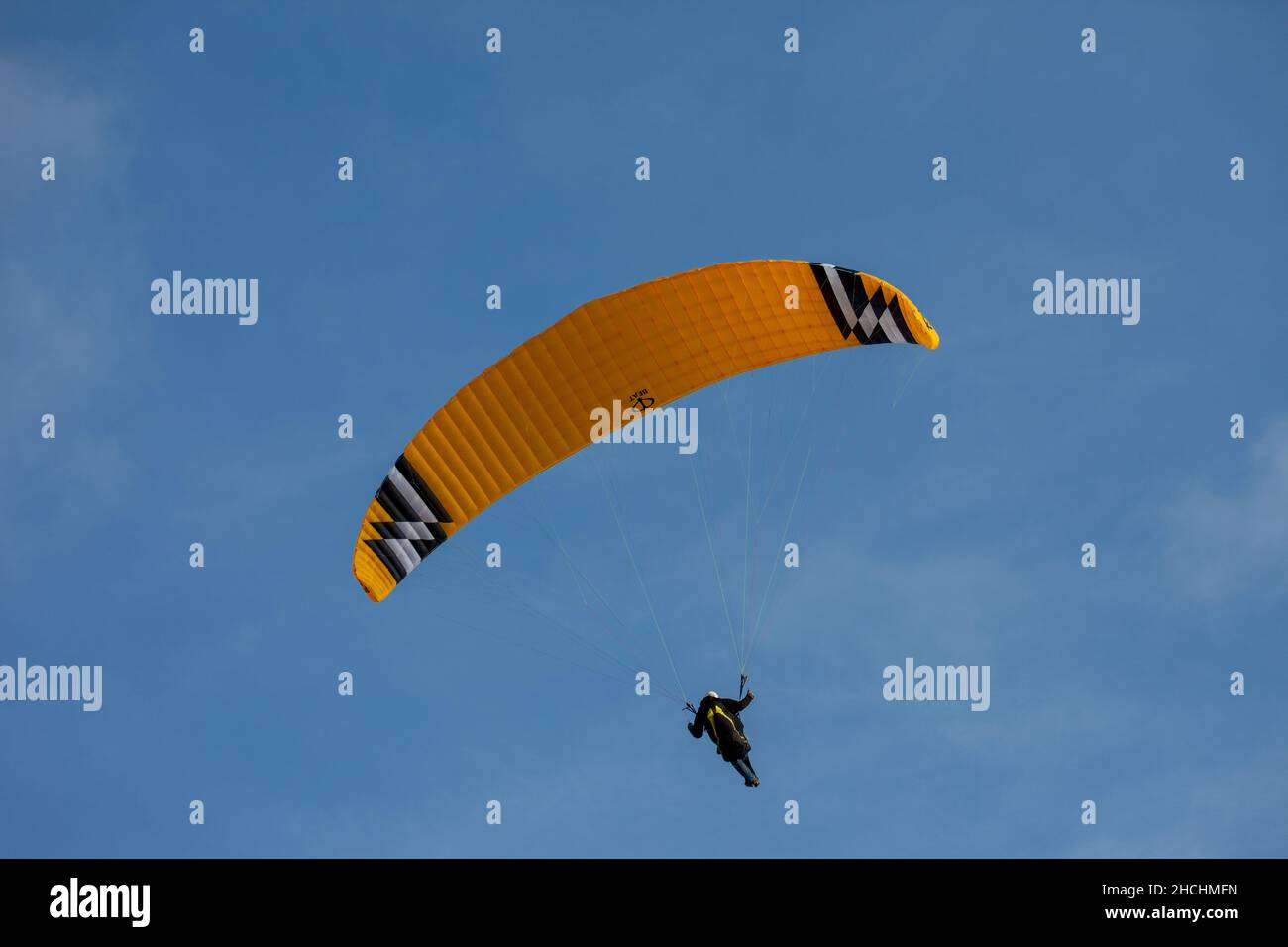 Paraglider above the cliffs at Charmouth Beach. Dorset. England. UK ...