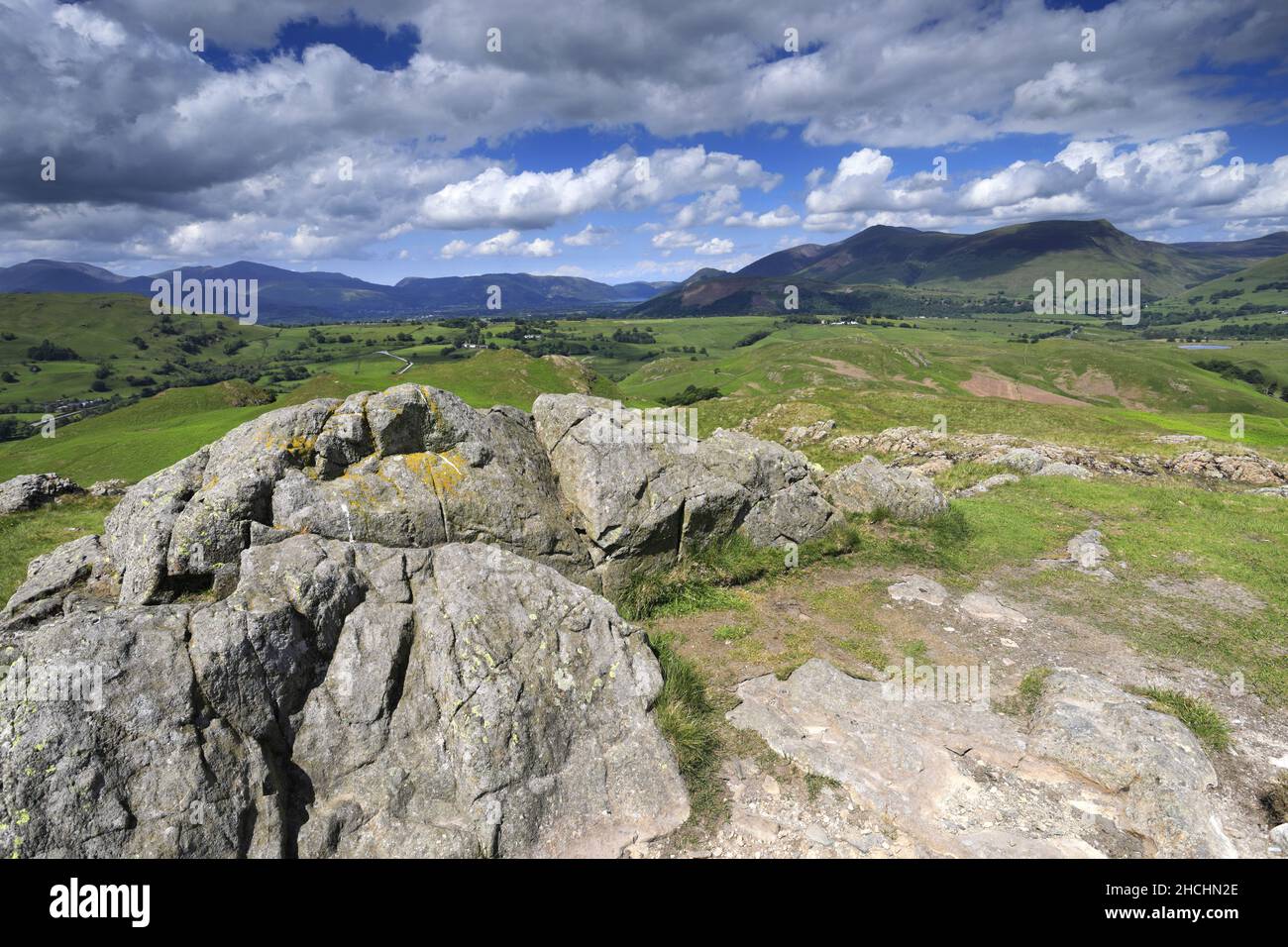 The summit cairn of High Rigg fell overlooking St Johns in the Vale ...