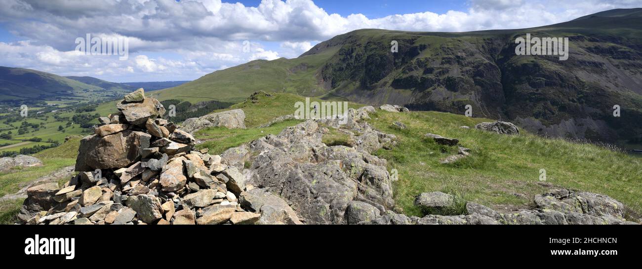 The summit cairn of High Rigg fell overlooking St Johns in the Vale ...