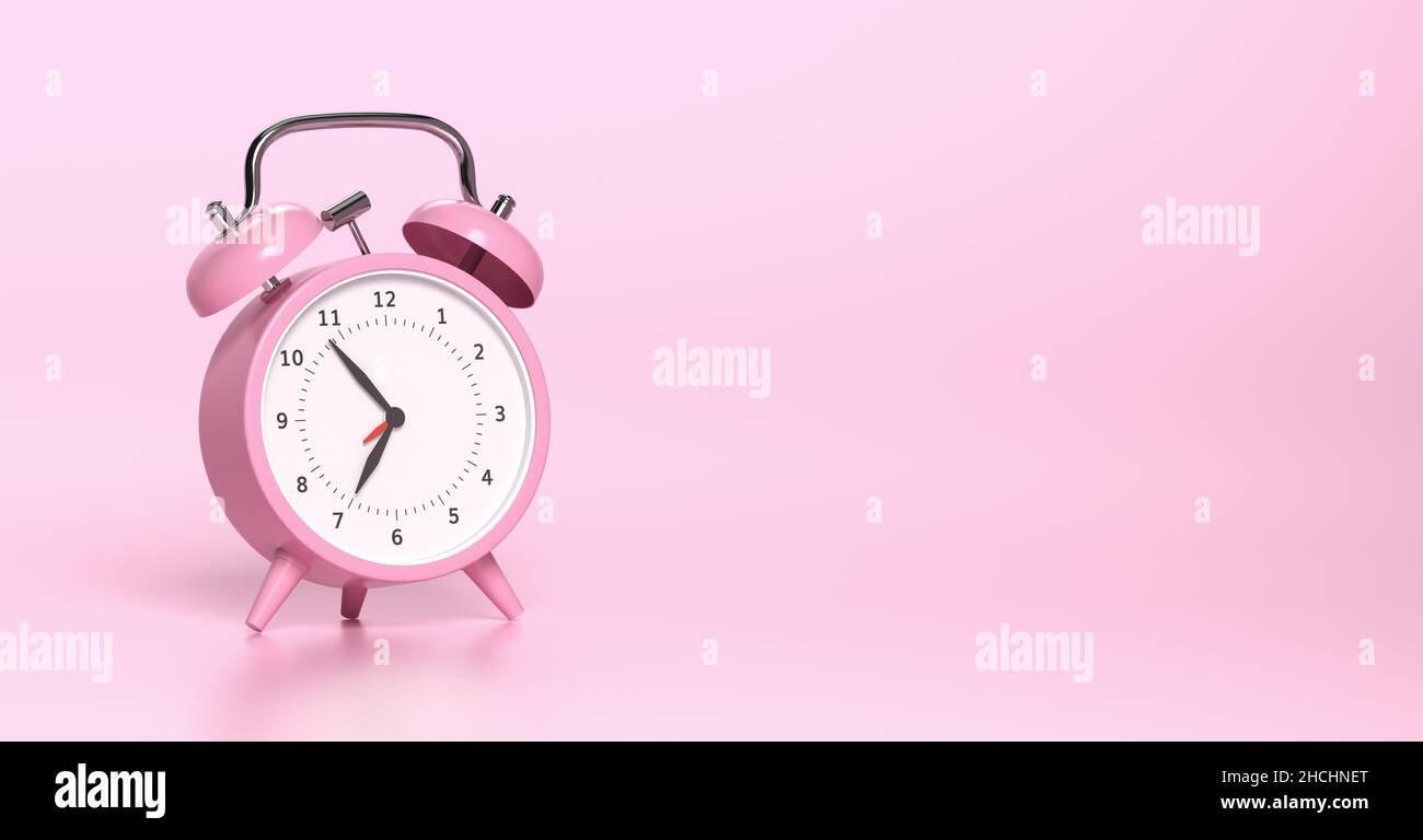 Pink vintage alarm clock with bright Pink background. Minimal creative ...