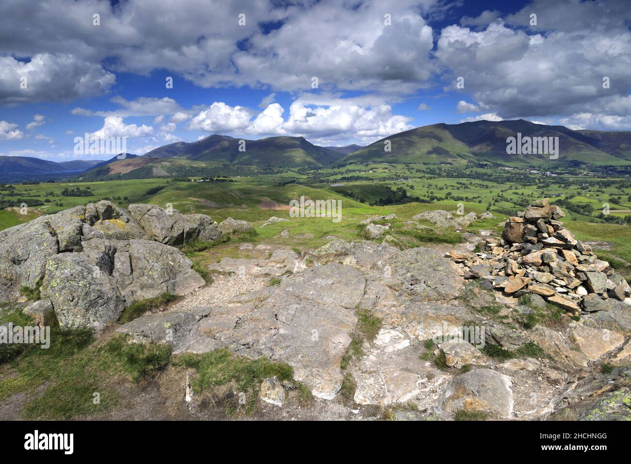 The summit cairn of High Rigg fell overlooking St Johns in the Vale ...