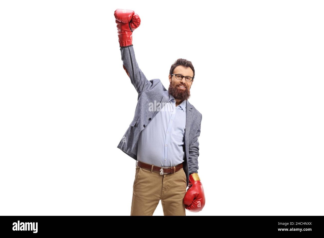 Bearded man with boxing gloves raising one arm isolated on white ...