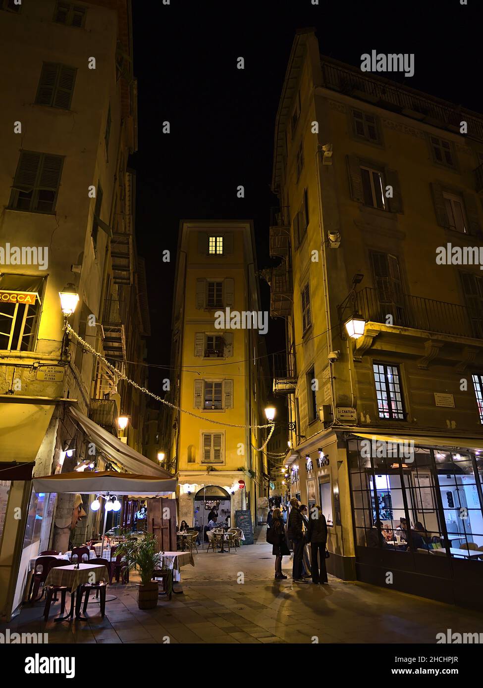 Night scene in the historic center of Nice, France with restaurants and ...