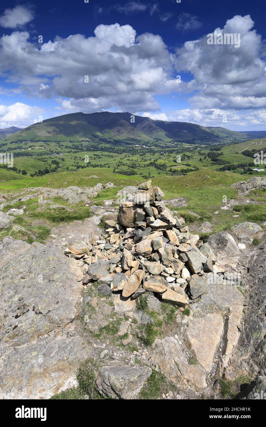 The summit cairn of High Rigg fell overlooking St Johns in the Vale ...