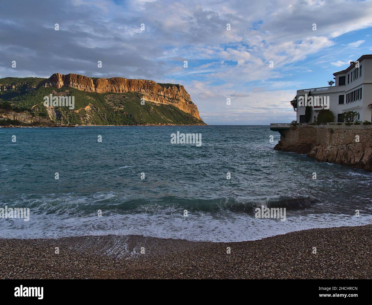 Pebble beach Plage du Bestouan at the mediterranean coast in small town ...