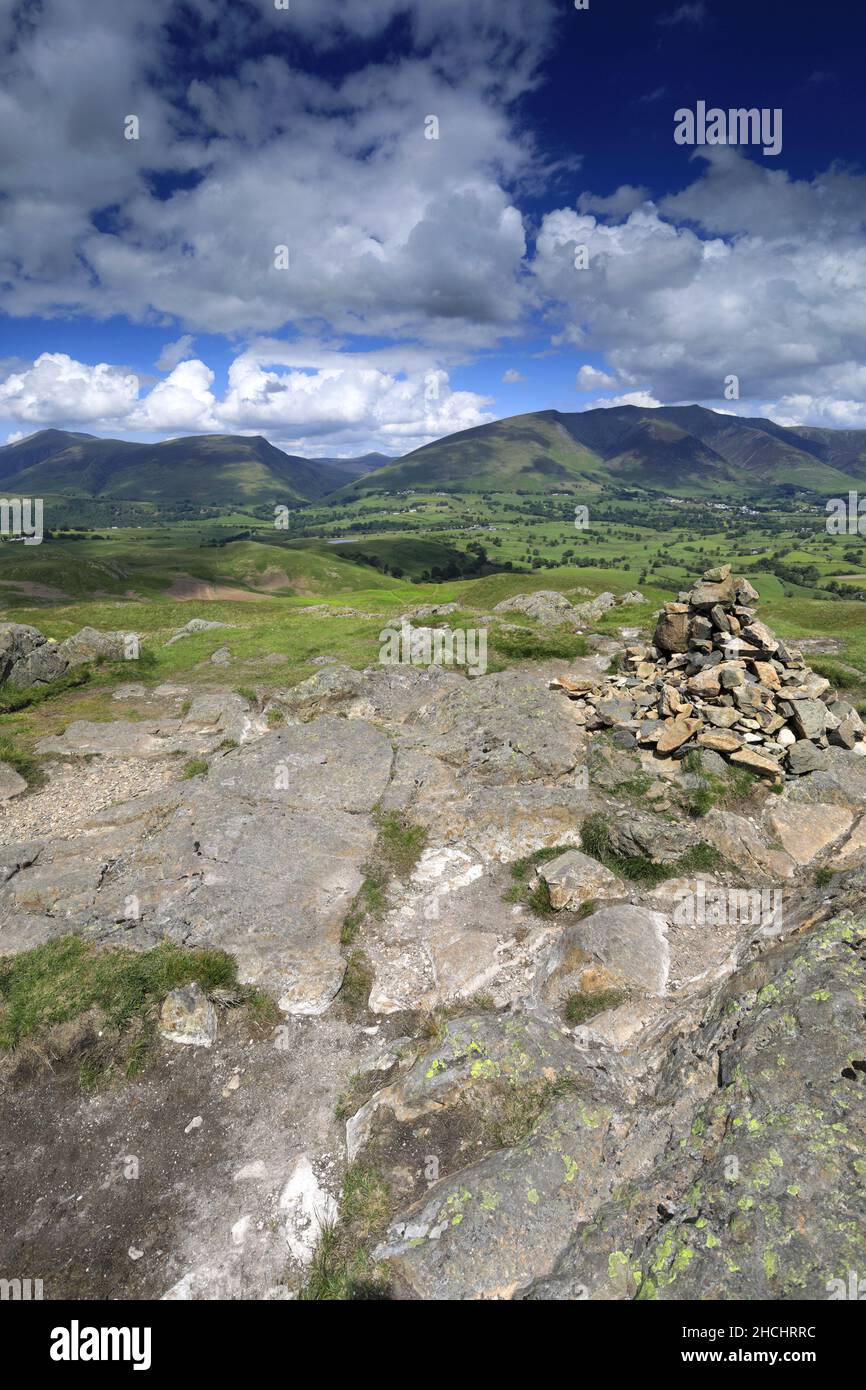 The summit cairn of High Rigg fell overlooking St Johns in the Vale ...