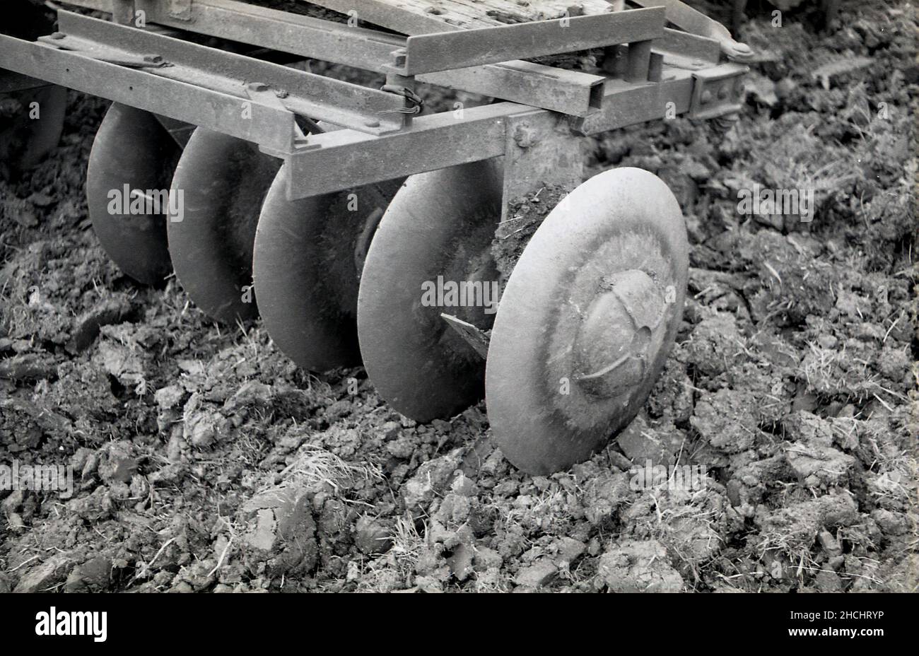 1960s, historical, a close-up view of the circular metal rollers on a ...