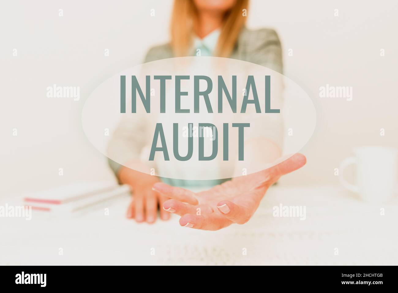 Conceptual display Internal Audit. Word Written on Evaluates the ...