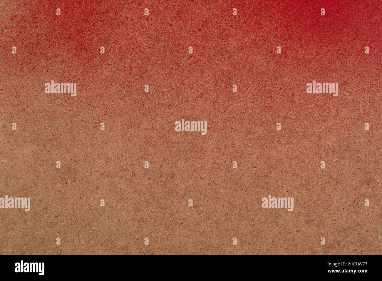 a mdf board painted with colored spray paint red Stock Photo - Alamy