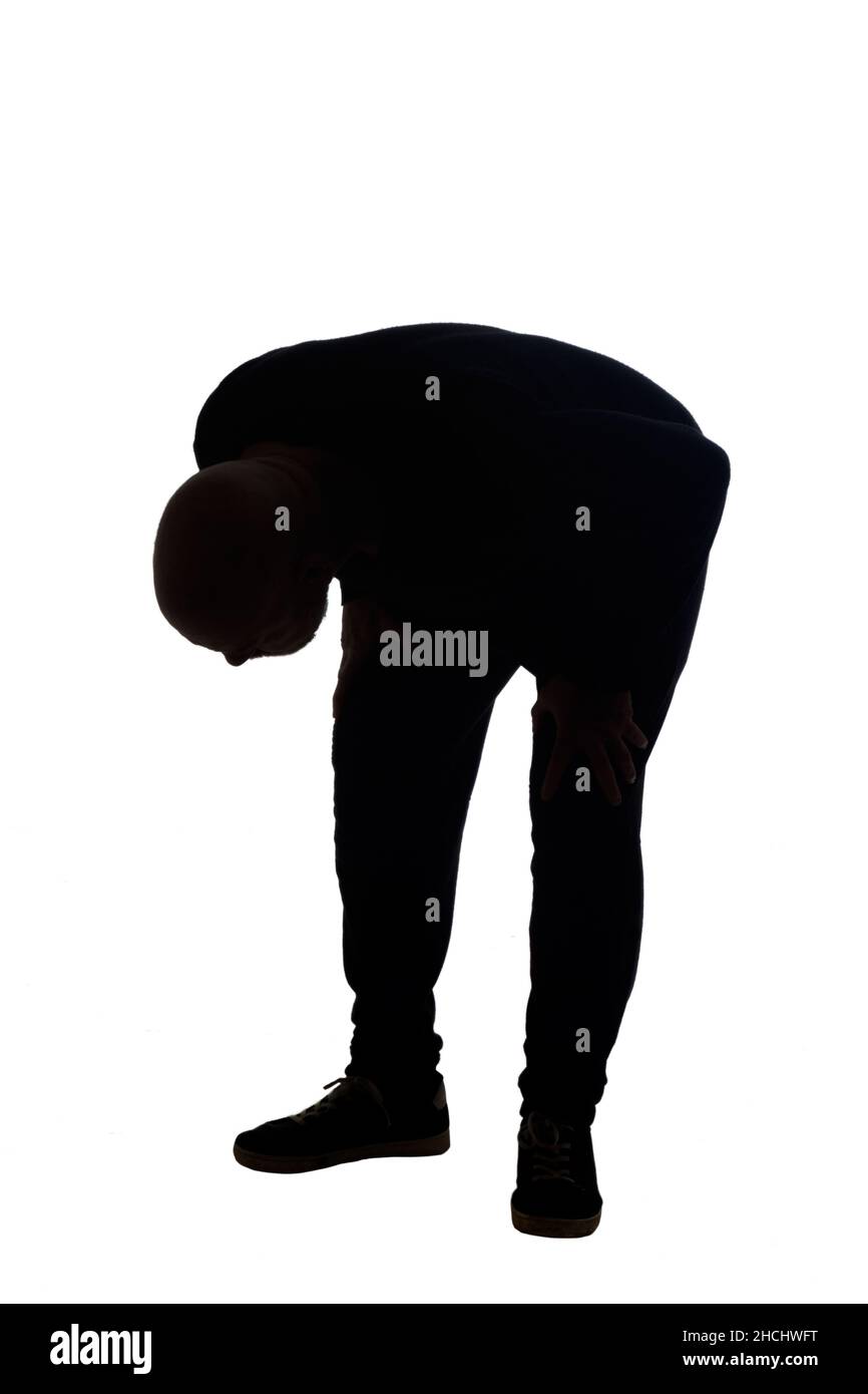silhouette of a man looking floor searching on white background Stock ...