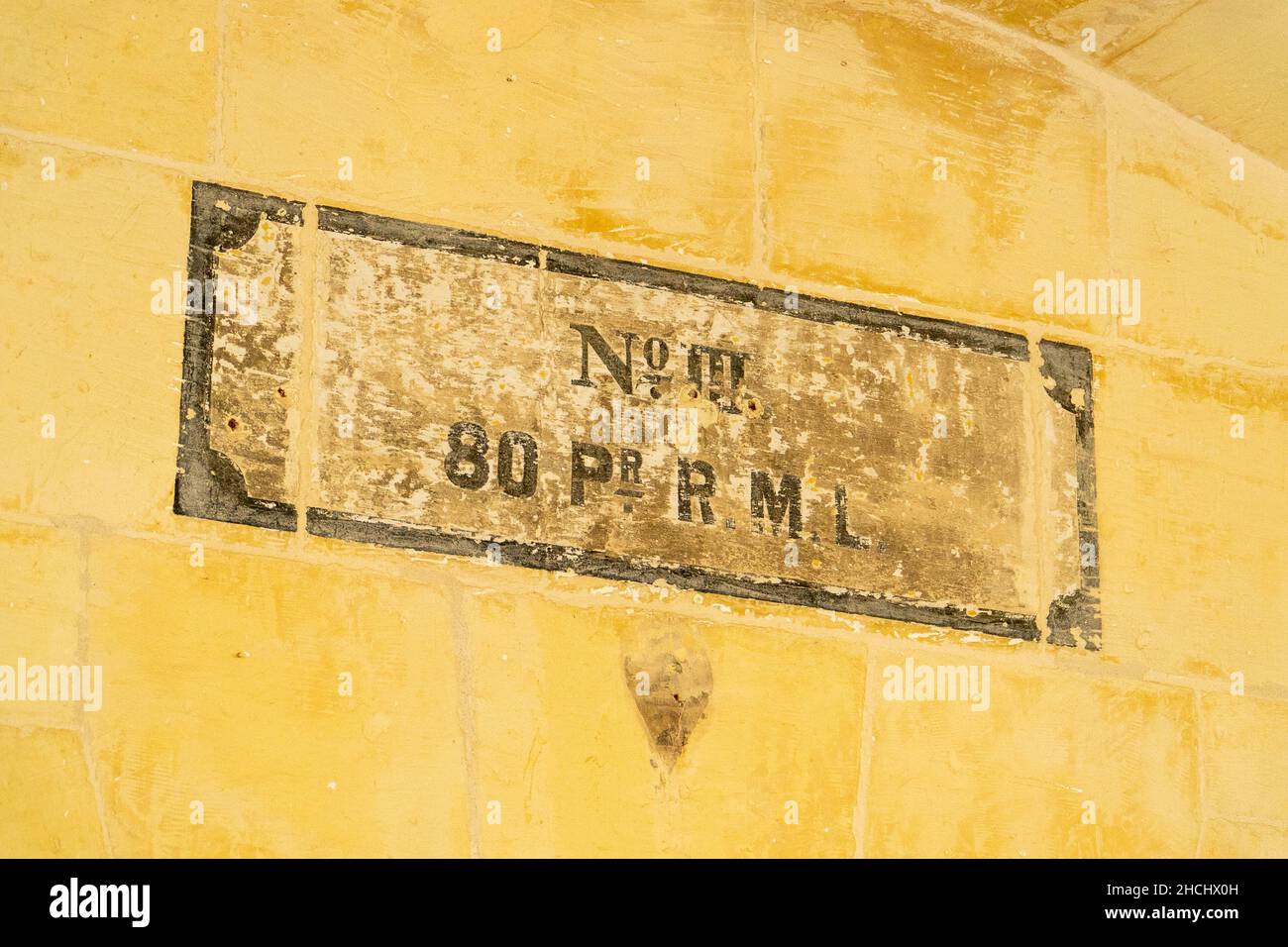 Old sign on rock walls Stock Photo - Alamy