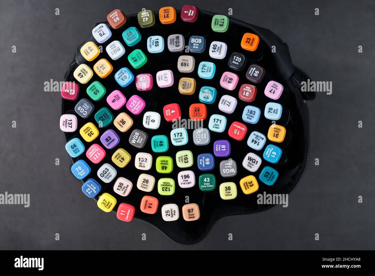 Professional sketching markers of different colors in a bag on a dark ...